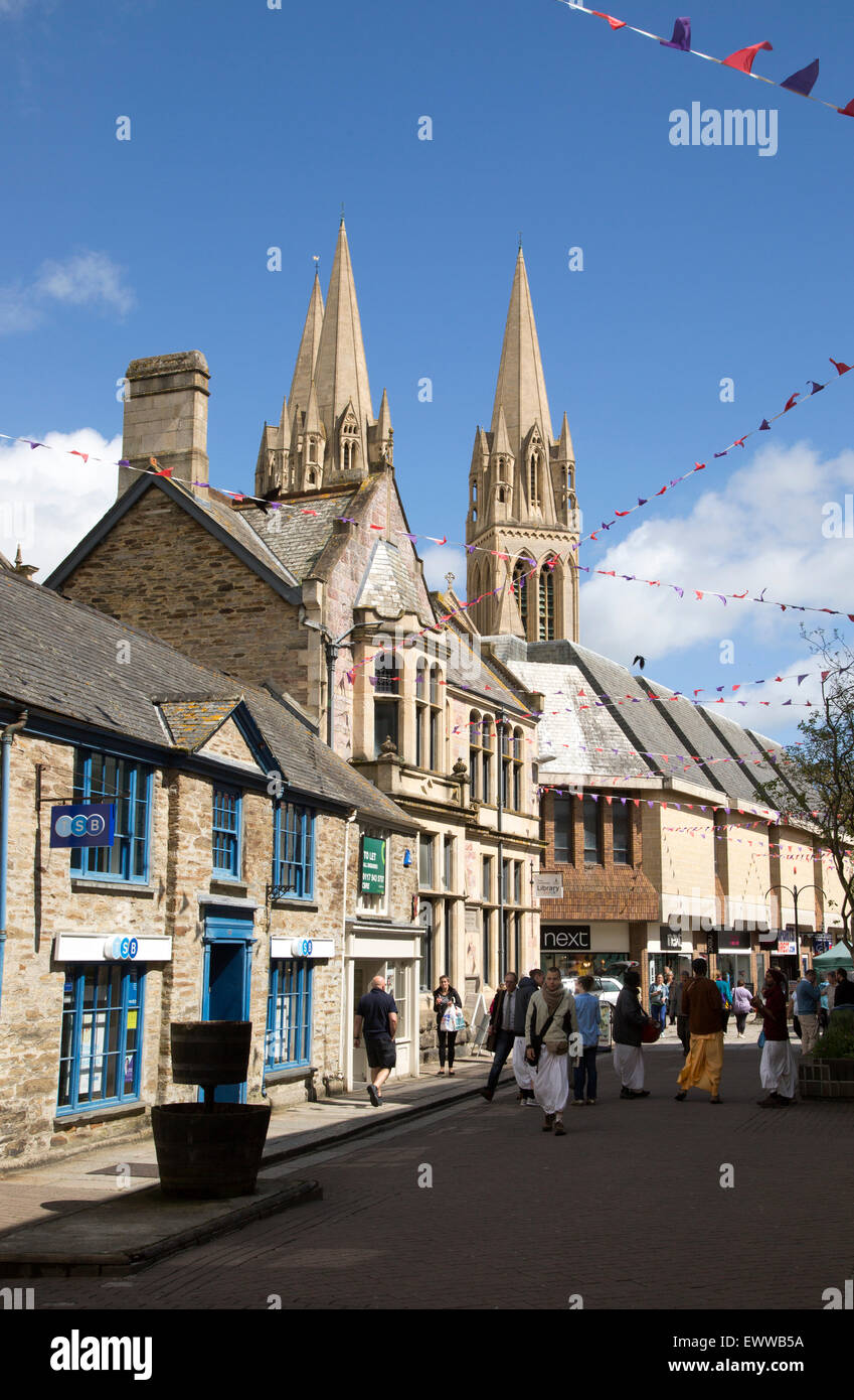 Spires of cathedral rise above historic city centre buildings, Truro ...