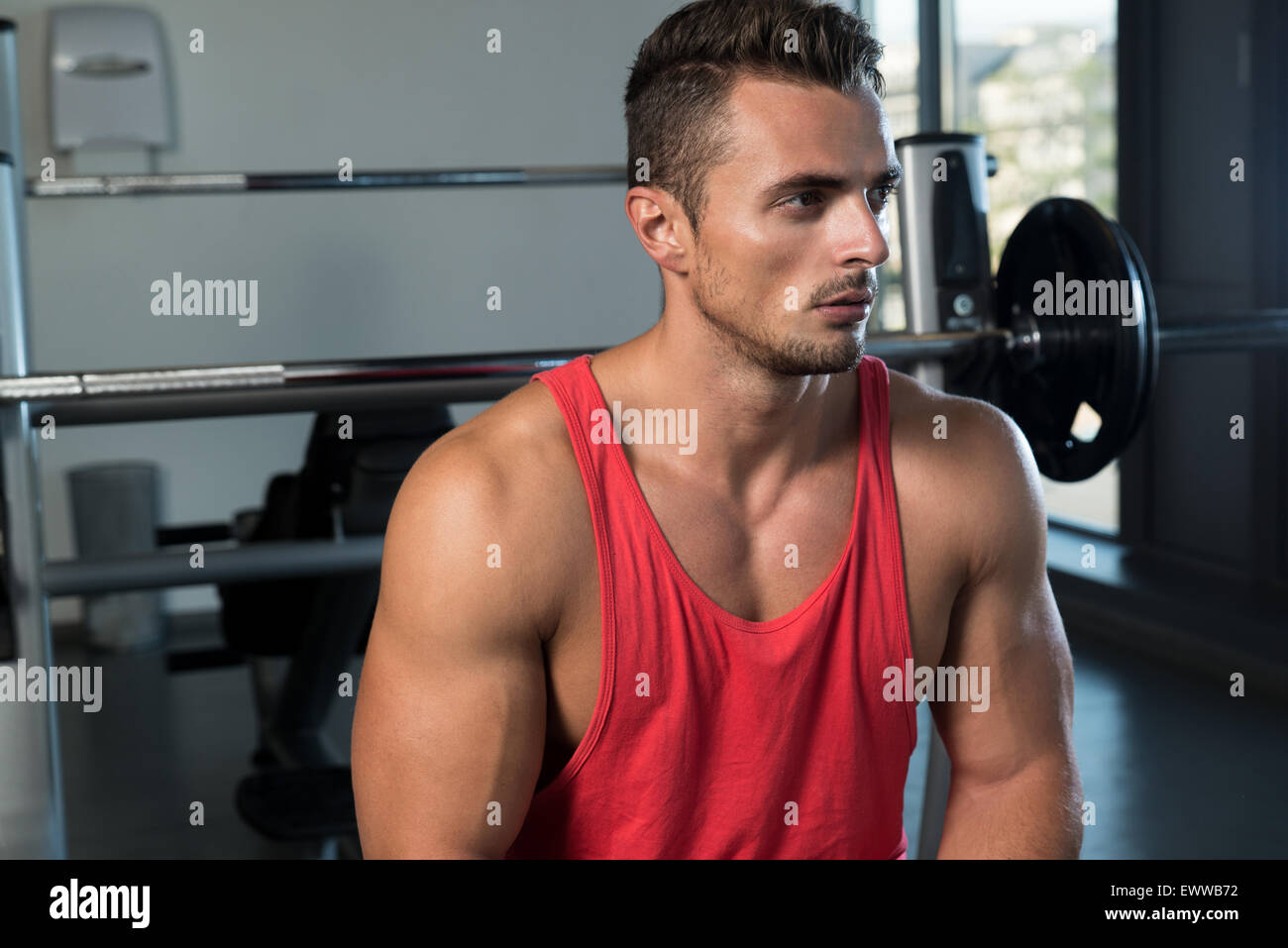 Man Resting After Exercises In Gym Stock Photo - Alamy