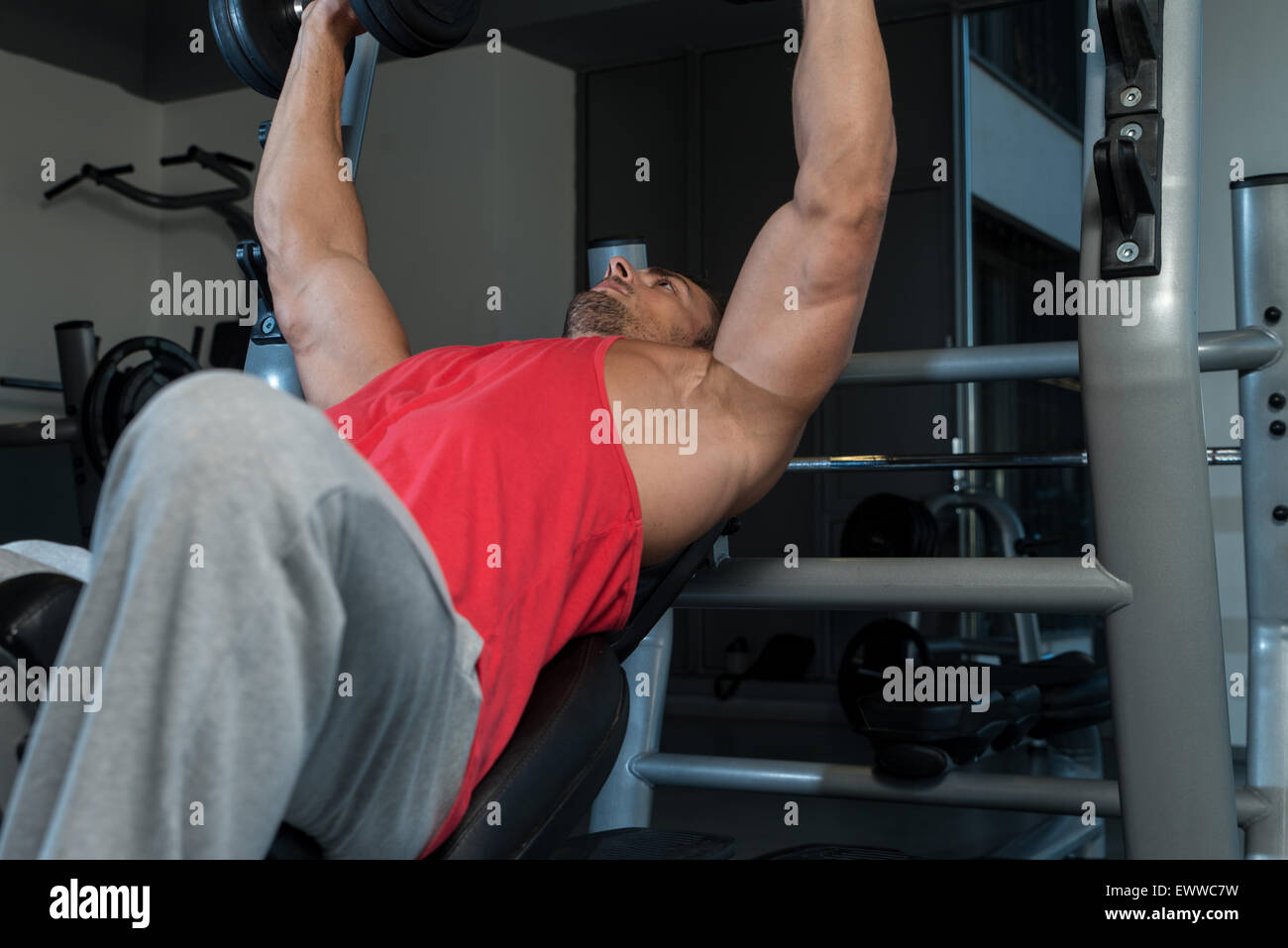 Man bench pressing weights hi-res stock photography and images - Alamy