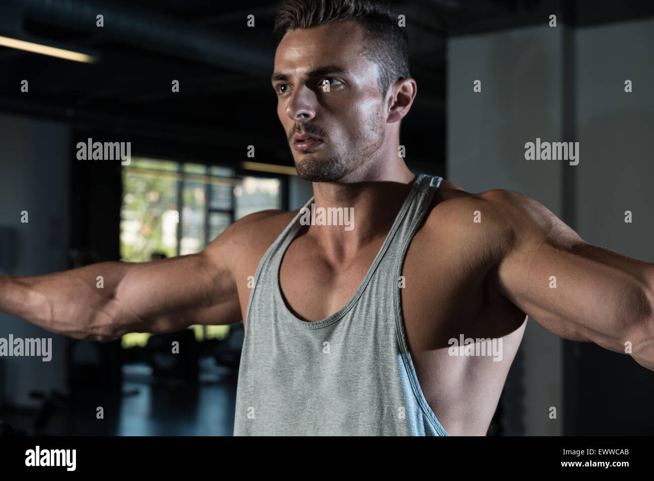 Shoulders Cable Lateral Raise Exercise Stock Photo - Alamy