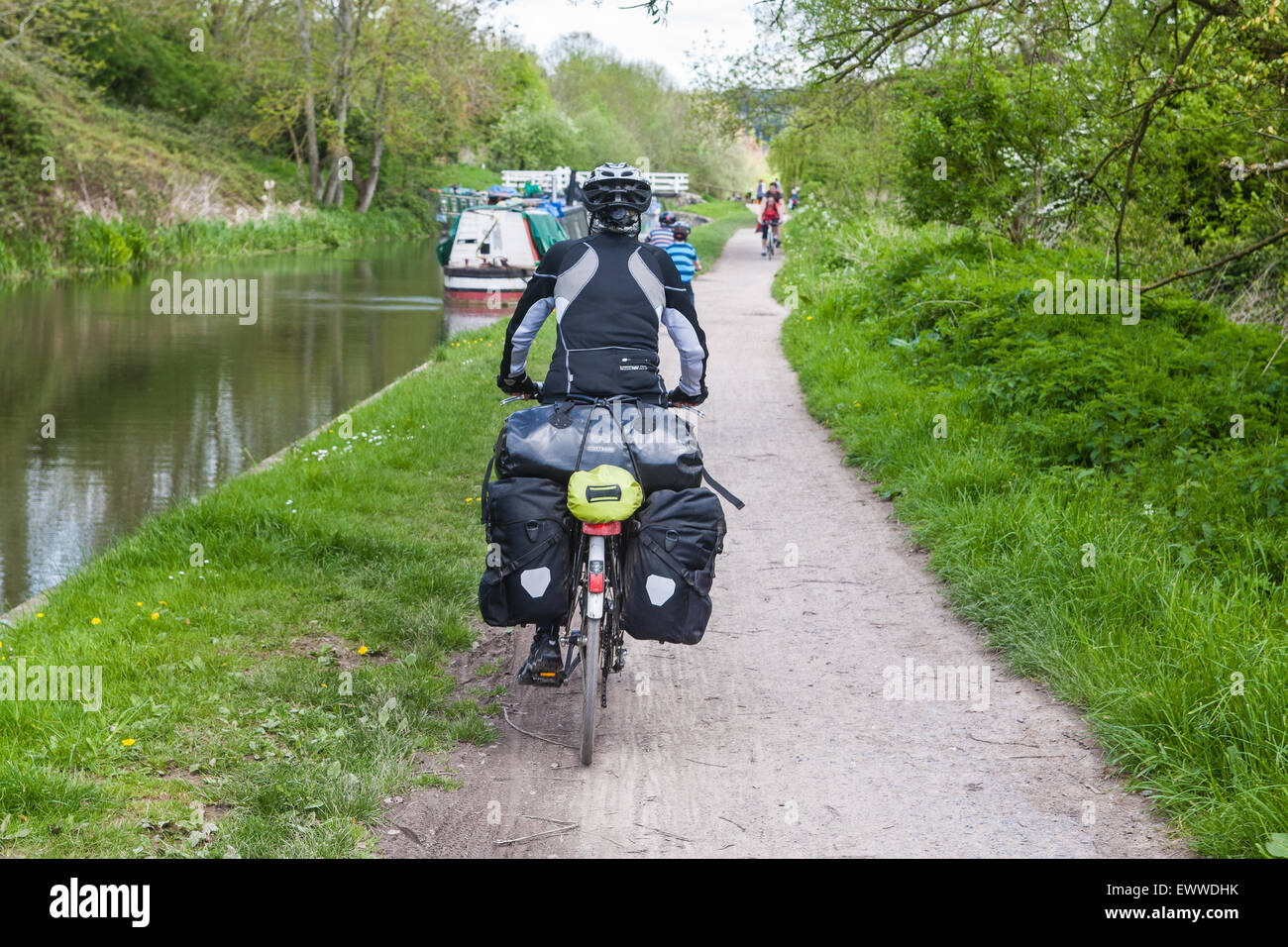 Canal path used by cyclists and walkers. Here cyclists cycling ...