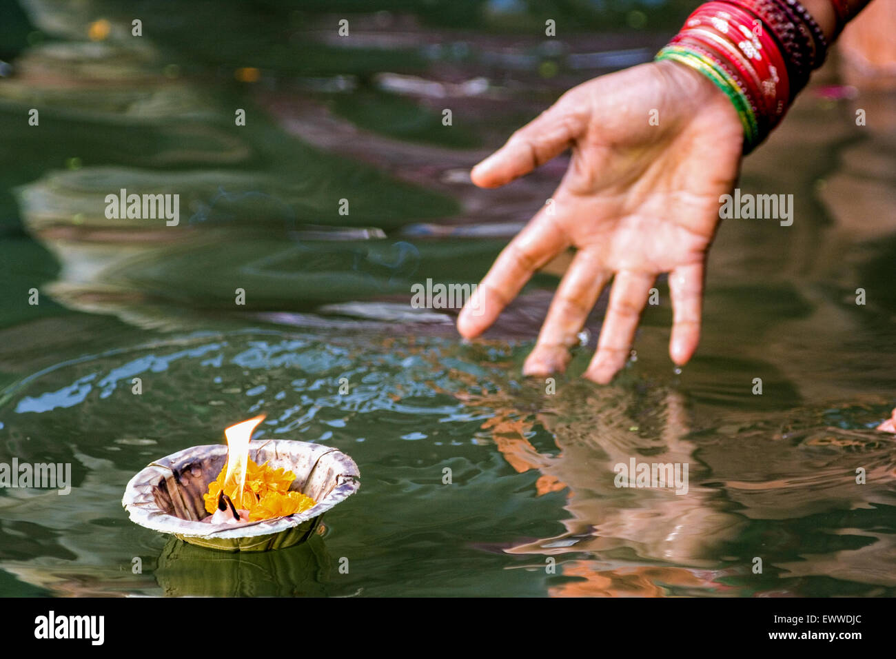 Indian woman bathing in holy hi-res stock photography and images - Alamy