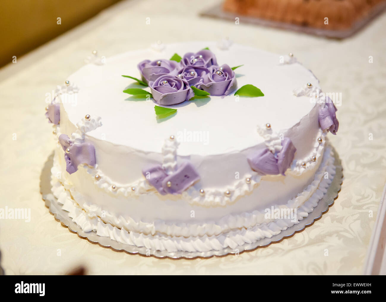 View at the white wedding cake Stock Photo - Alamy