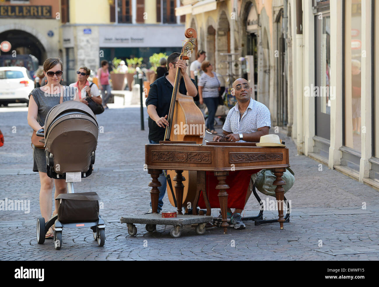 Busker buskers with double bass and piano street music in Annecy Stock ...