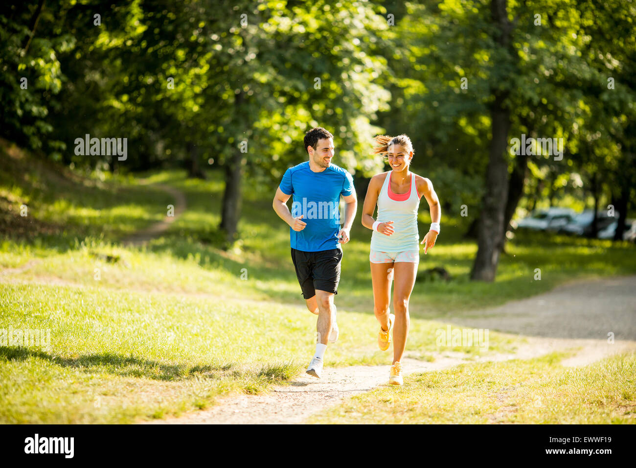 Running couple hi-res stock photography and images - Alamy