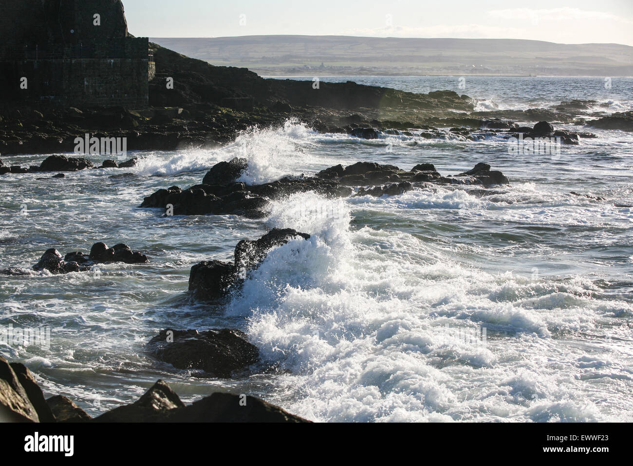 Atlantic ocean reaches land at port stewart hi-res stock photography ...