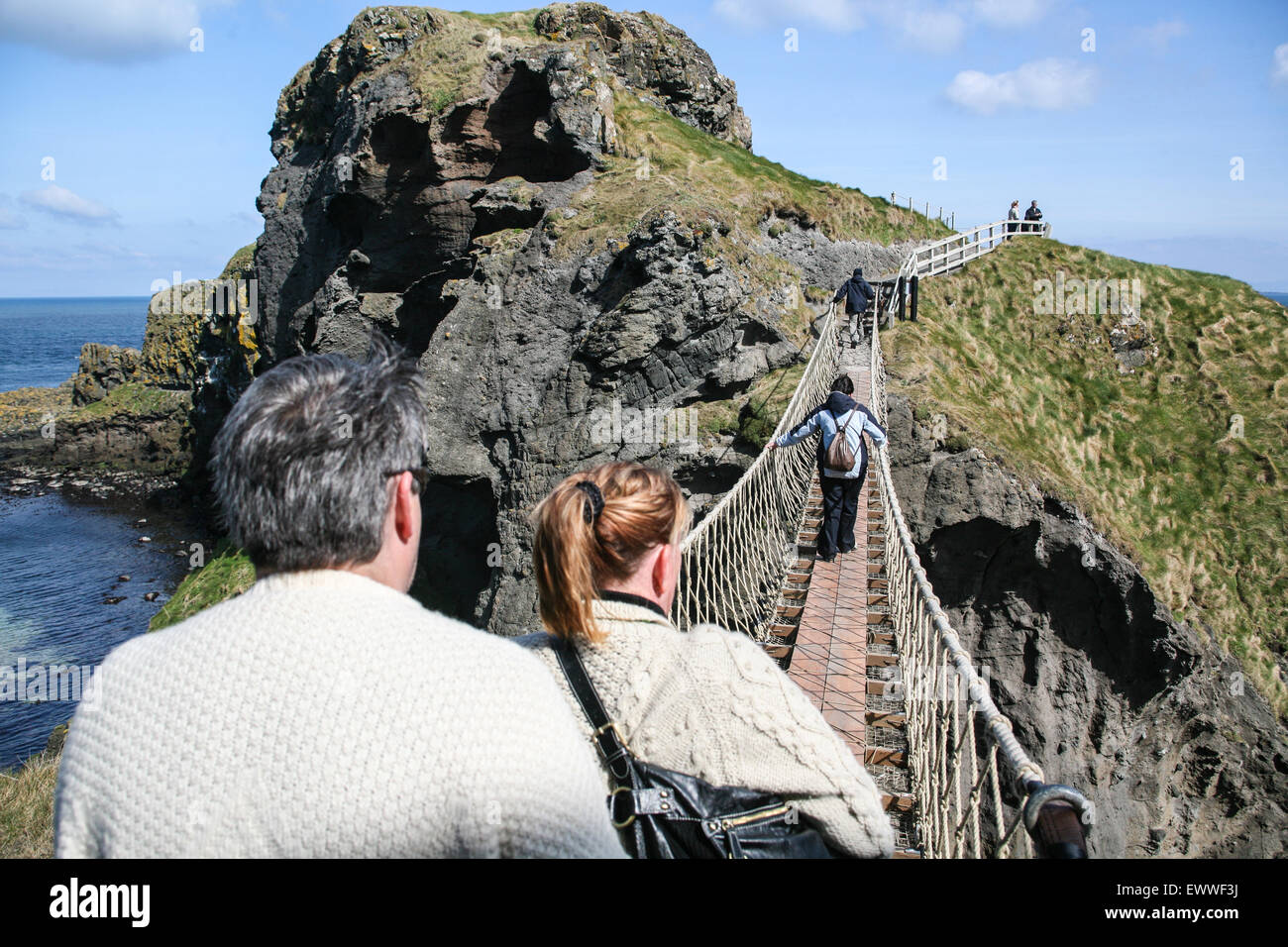 Crossing Carrick a Rede rope bridge, a suspension bridge which spans 20 ...