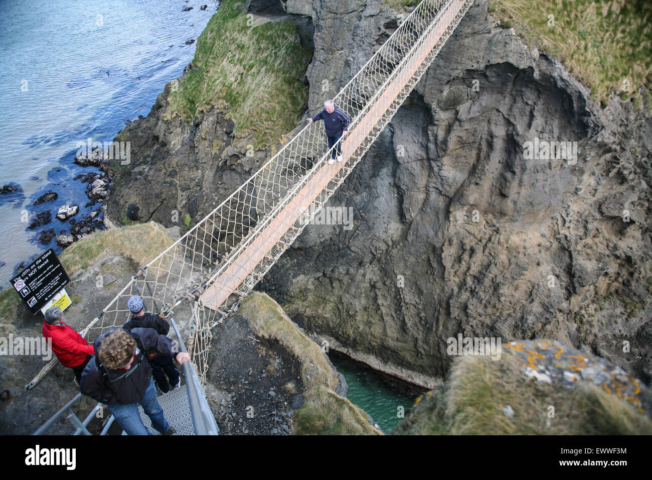 Crossing Carrick a Rede rope bridge, a suspension bridge which spans 20 ...