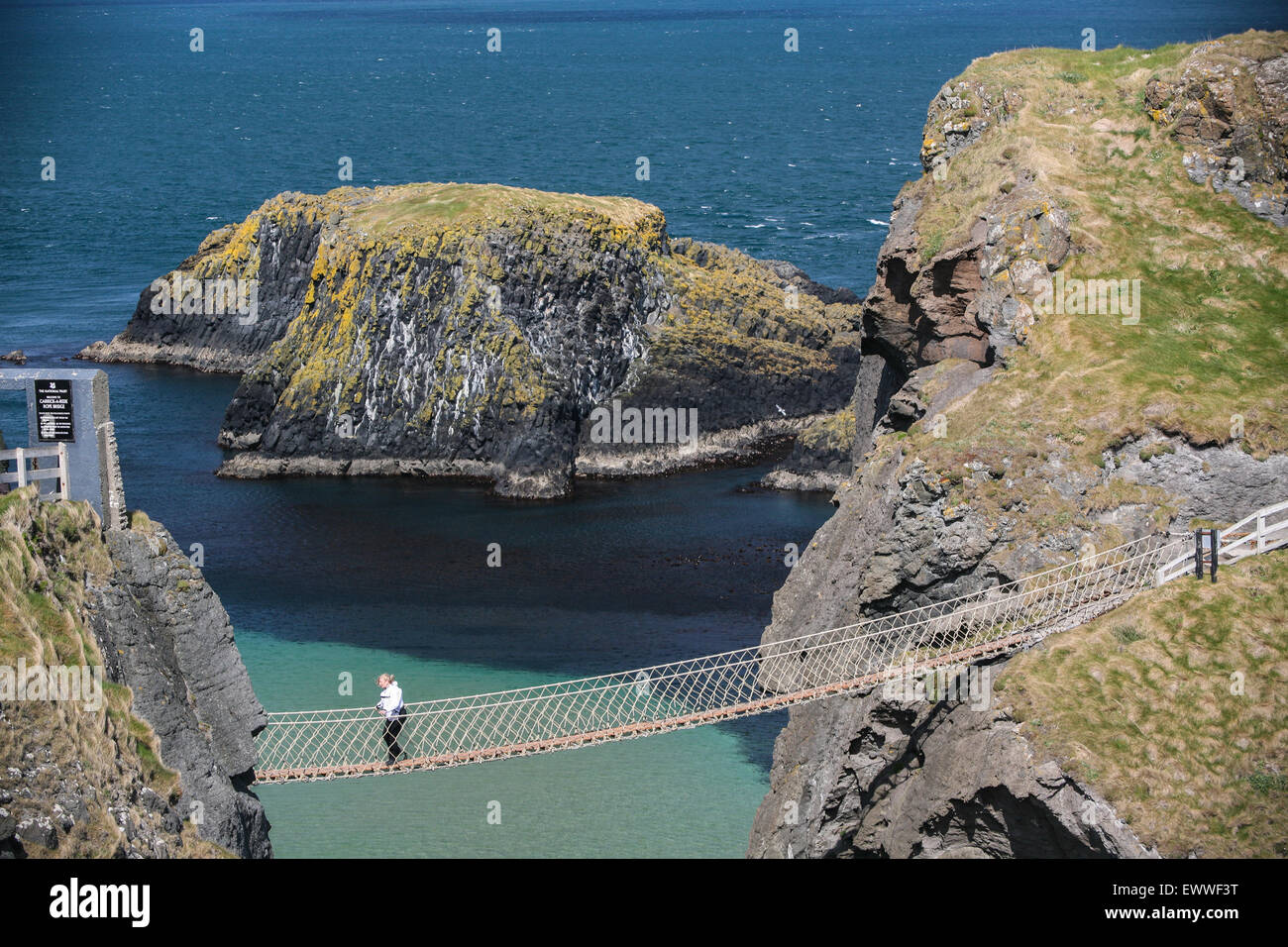 Crossing Carrick a Rede rope bridge, a suspension bridge which spans 20 ...