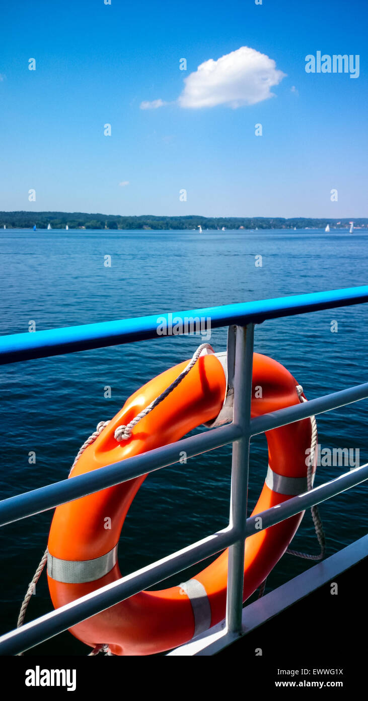 Lifebuoy on board ship at blue sky background Stock Photo - Alamy