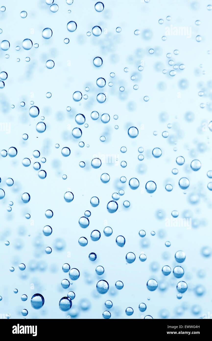 Water bubbles in a glass container close up Stock Photo - Alamy
