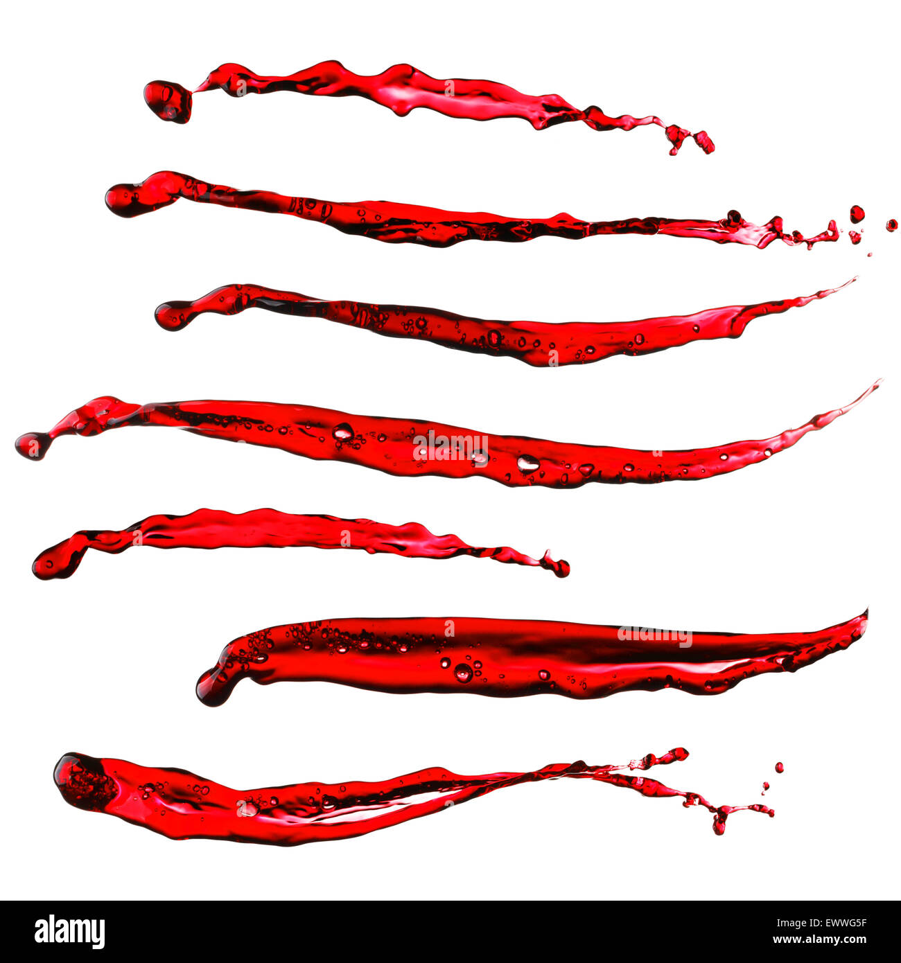 Red wine splashes isolated on white background Stock Photo - Alamy