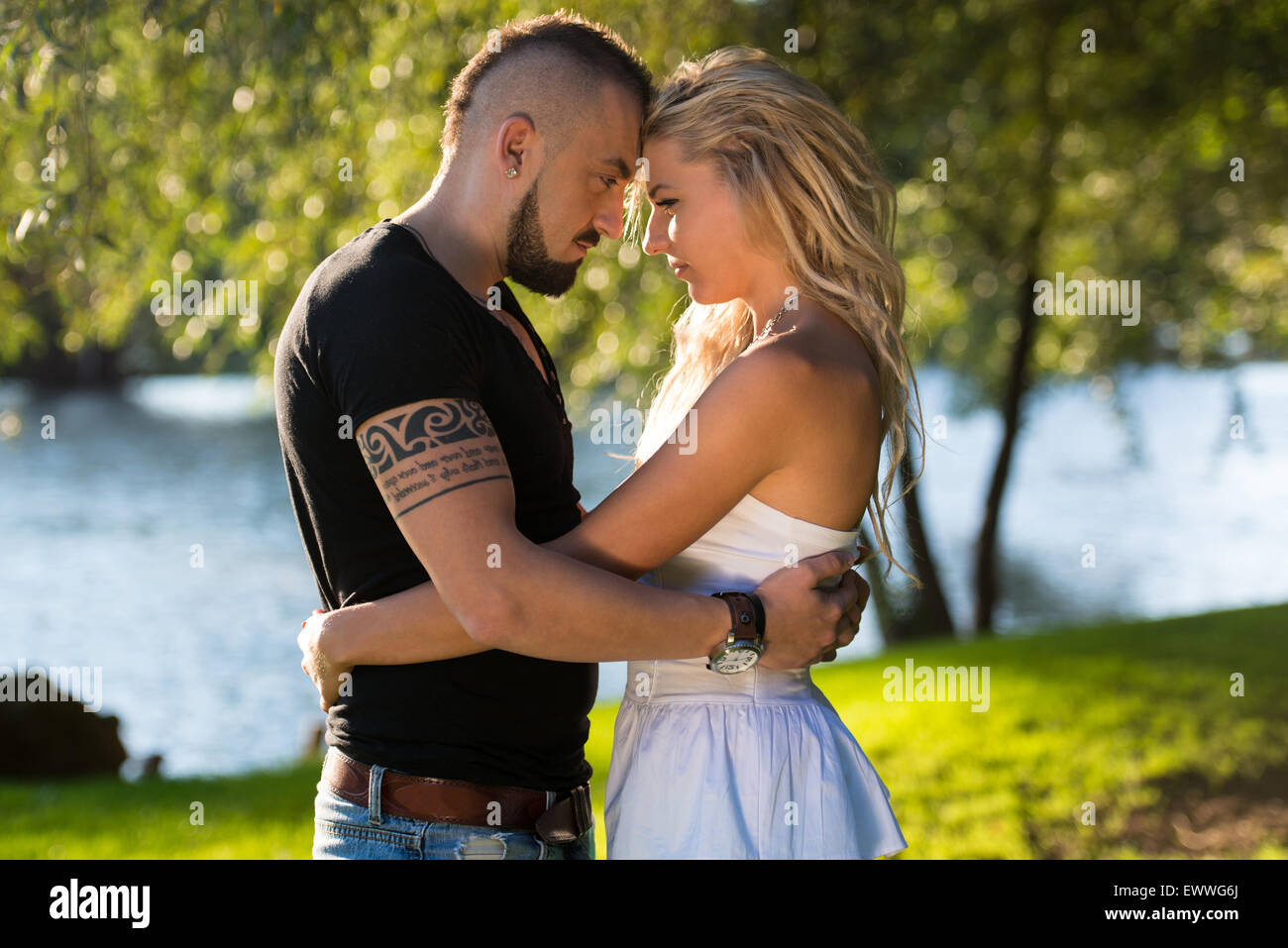 Two heads together men hi-res stock photography and images - Alamy