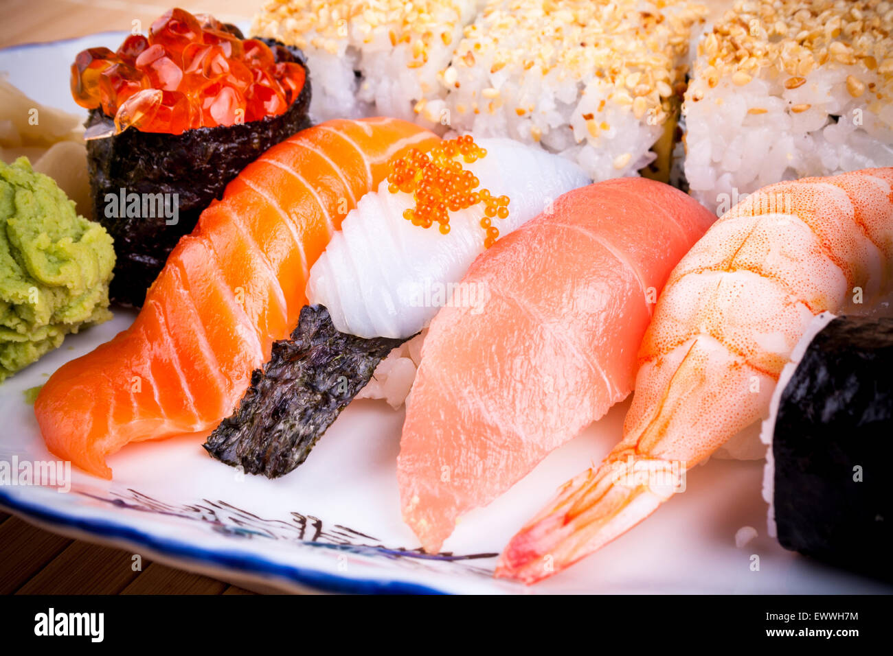 Various fish sushi with salmon ikura, close up Stock Photo - Alamy