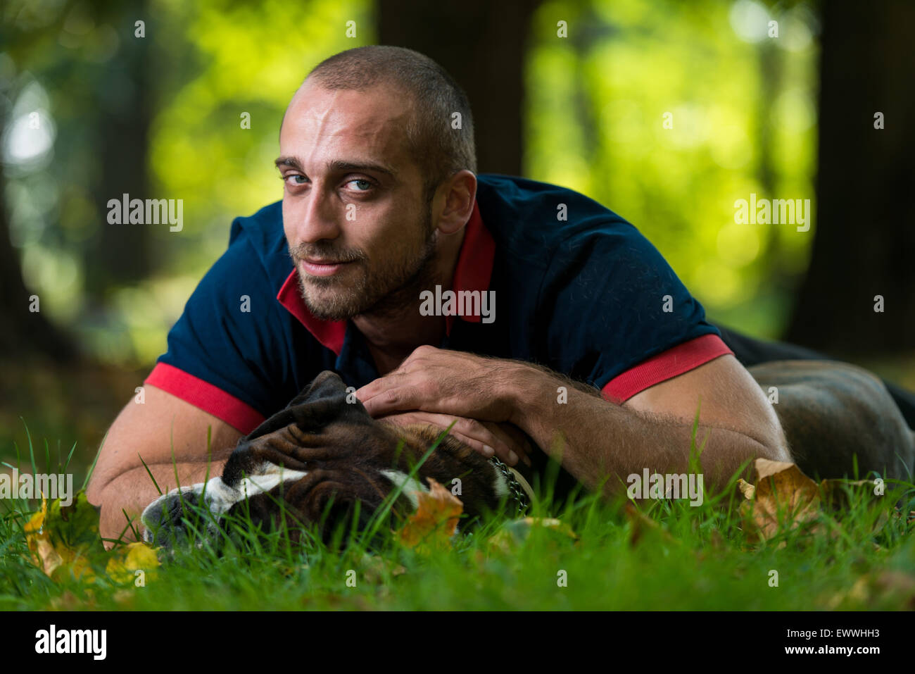Close-Up Of A Young Man With His Dog Stock Photo - Alamy