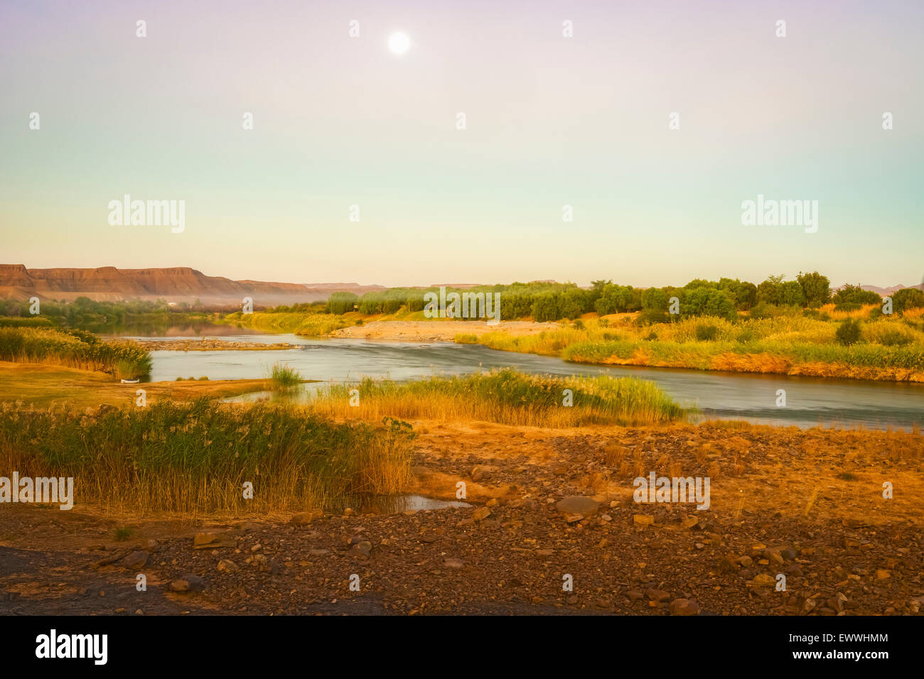 Scenic sunset view at the Orange river in Noordoewer in Namibia at ...