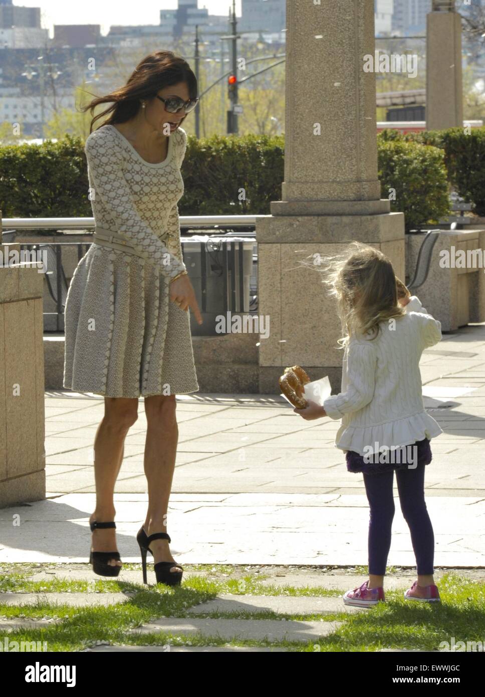 Bethenny Frankel and her daughter Bryn spend time in a local park on a ...