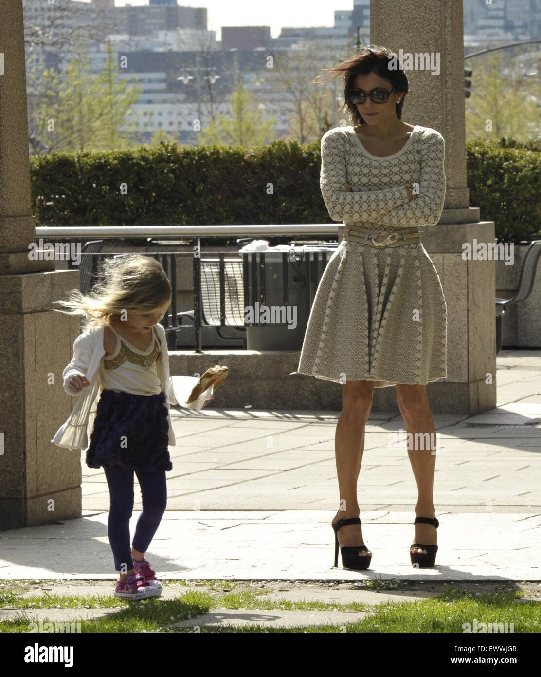 Bethenny Frankel and her daughter Bryn spend time in a local park on a ...