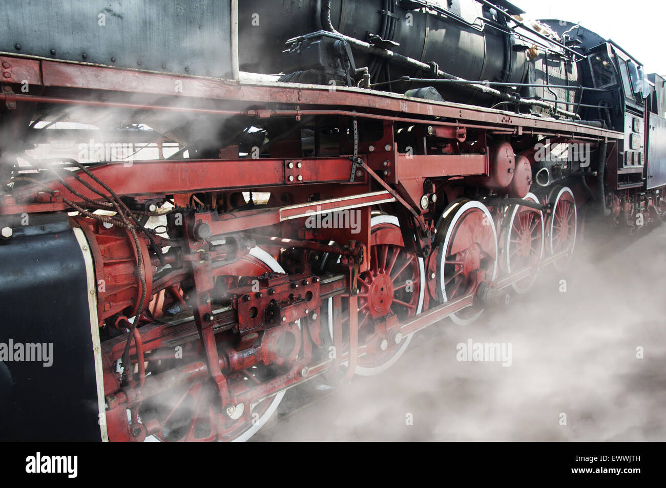 Steam locomotive rolling by close Stock Photo - Alamy