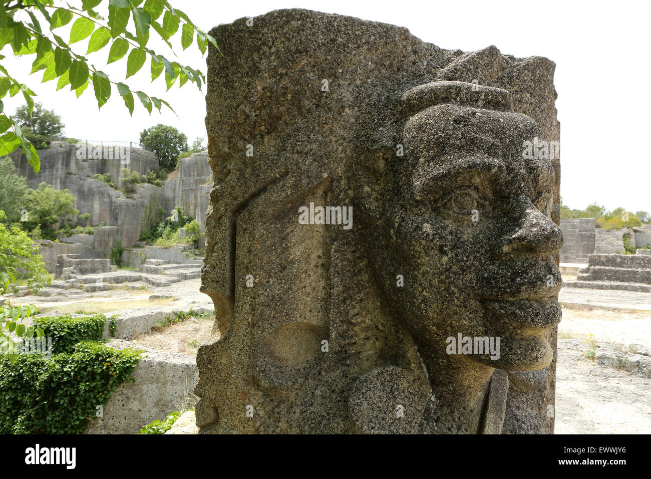 Sculpture of a person with negroid features at the limestone quarry in ...