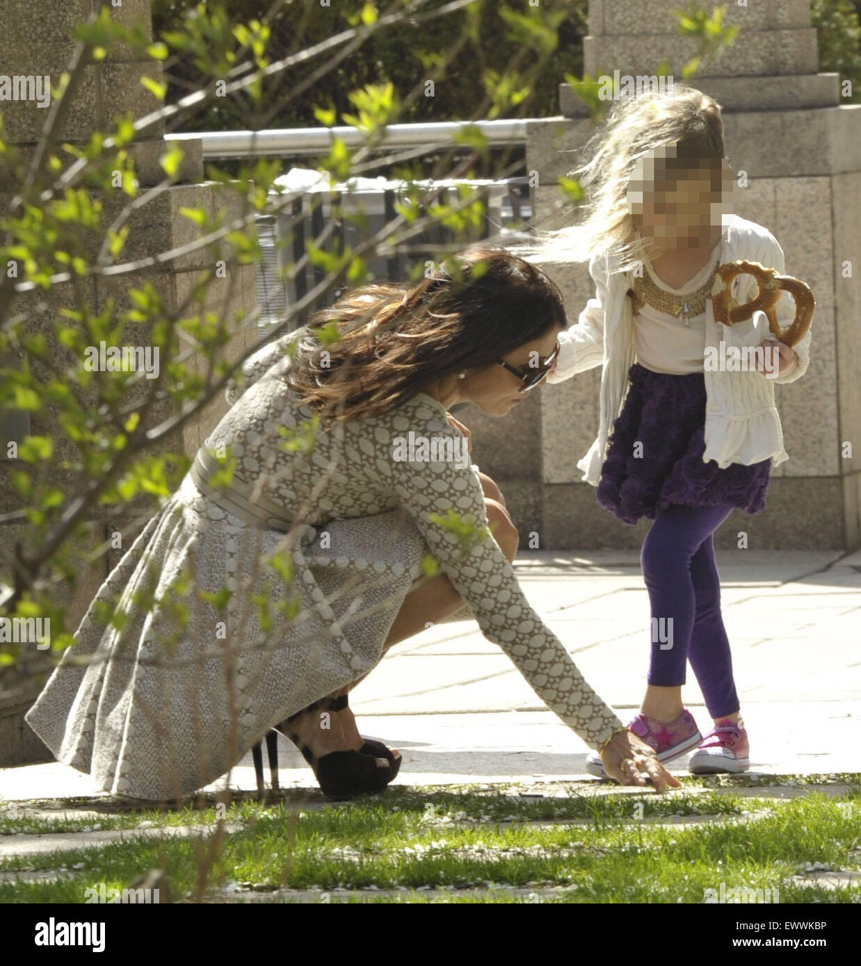 Bethenny Frankel and her daughter Bryn spend time in a local park on a ...