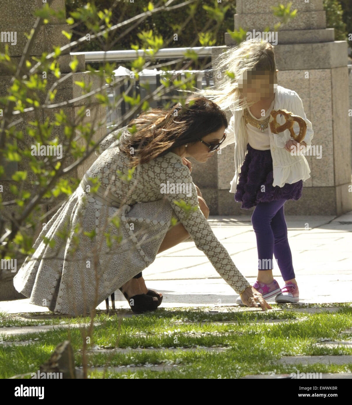 Bethenny Frankel and her daughter Bryn spend time in a local park on a ...