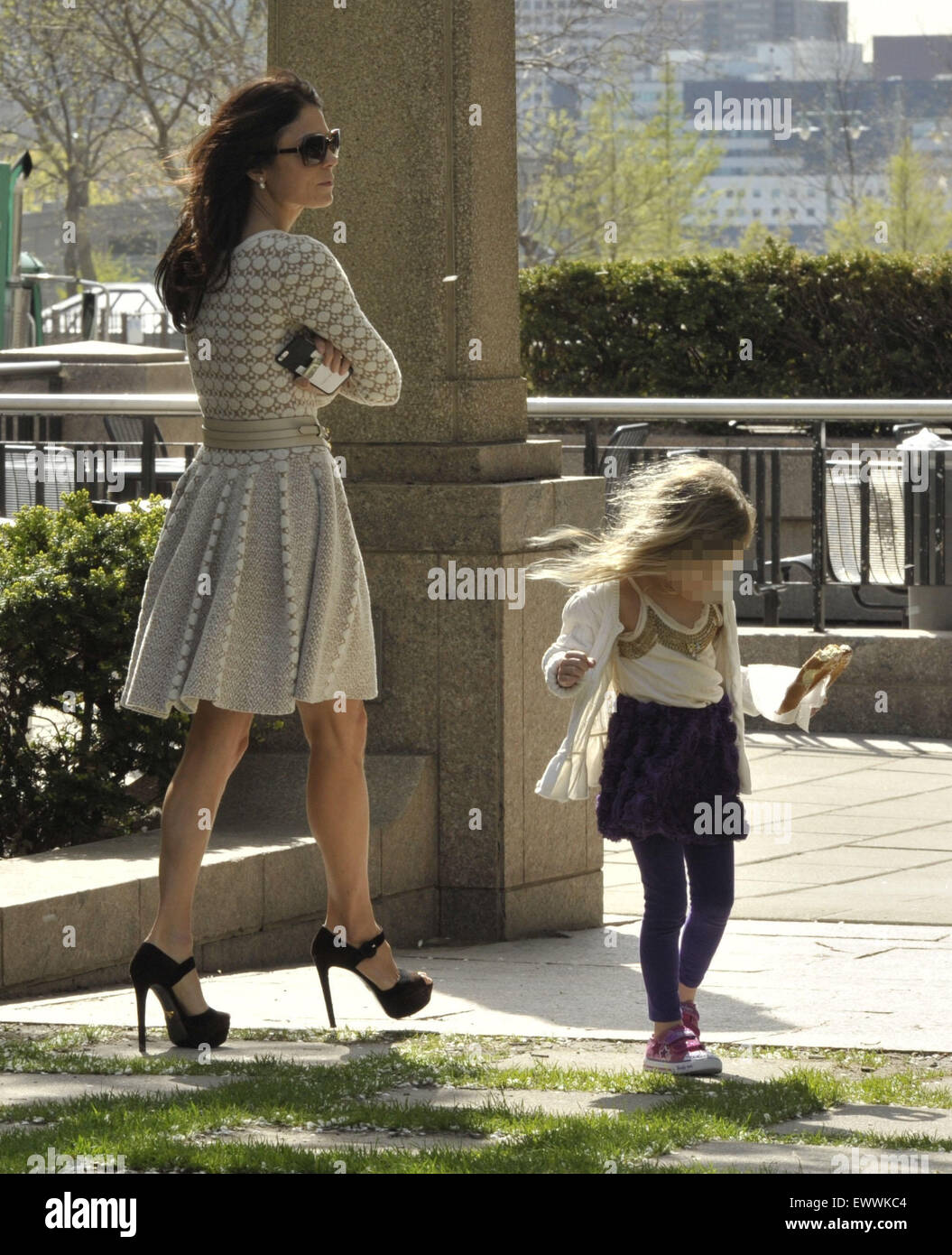 Bethenny Frankel and her daughter Bryn spend time in a local park on a ...