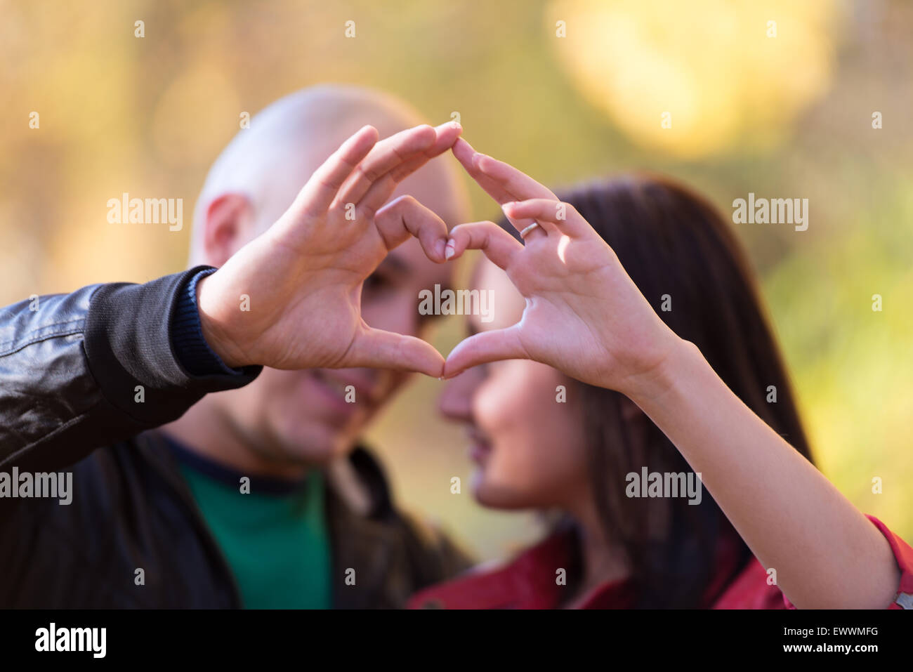 Couple Forming A Heart Stock Photo - Alamy