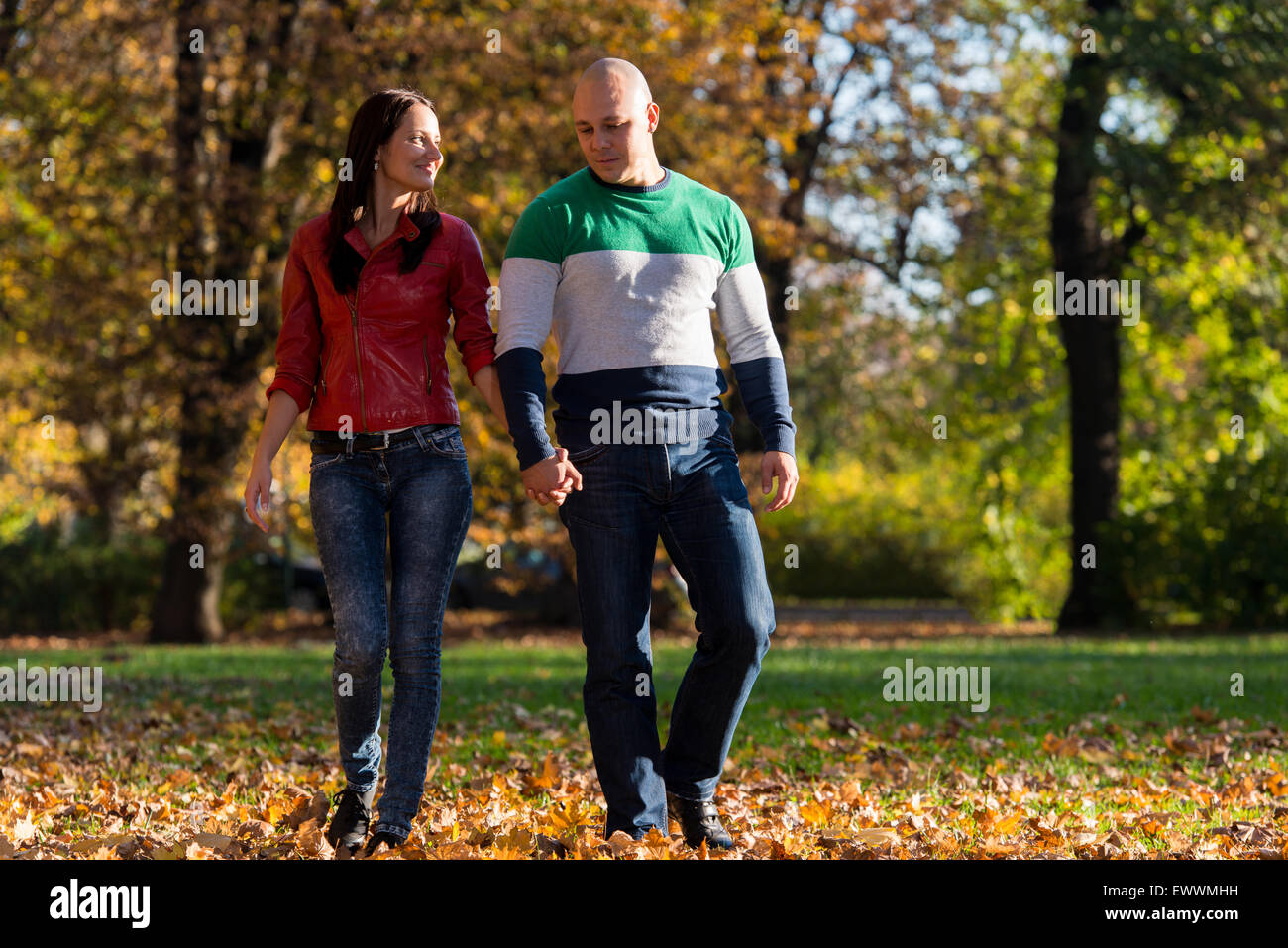 Loving couple walking in woods hi-res stock photography and images - Alamy