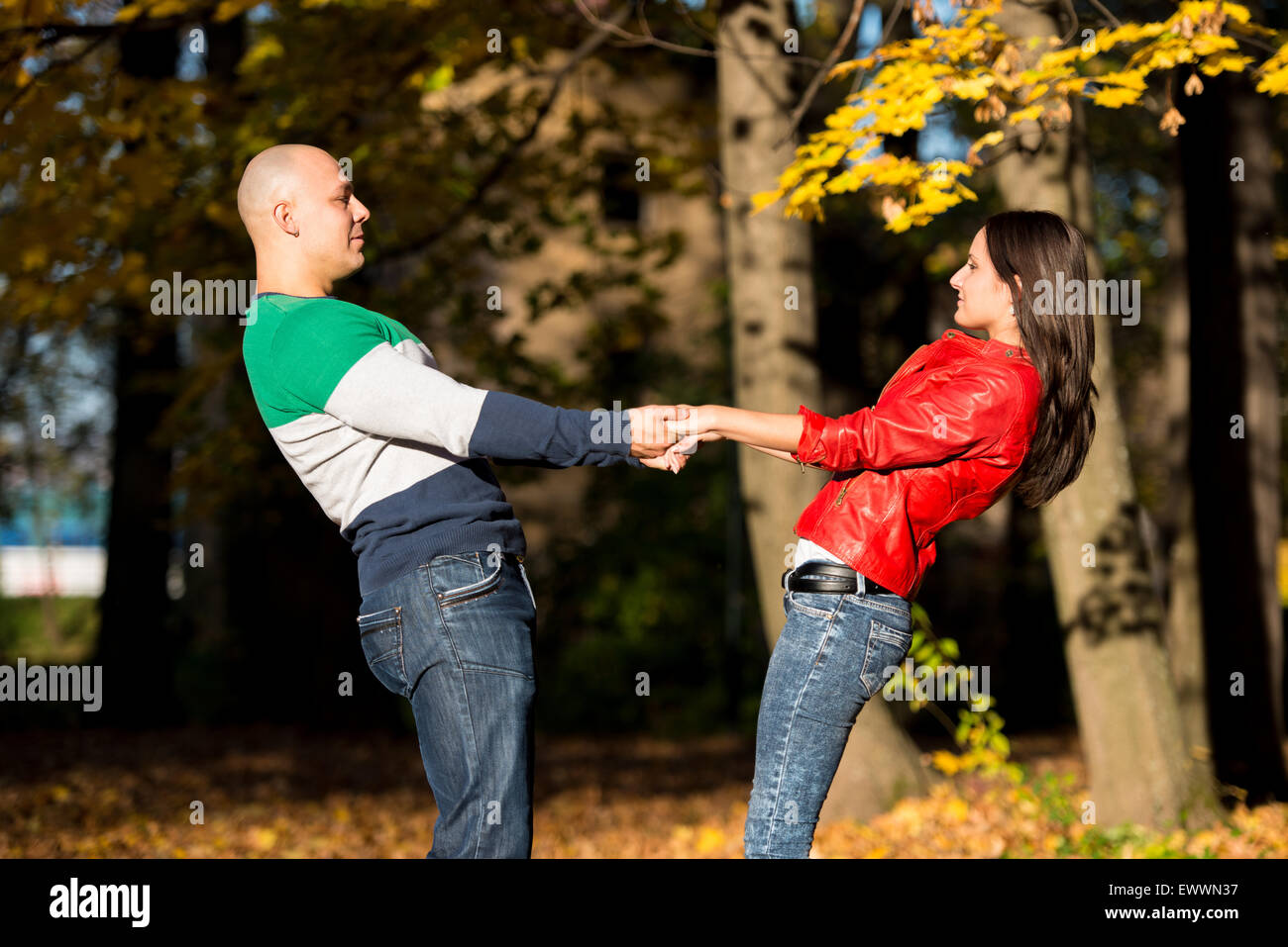 Happy woman spinning around hi-res stock photography and images - Alamy