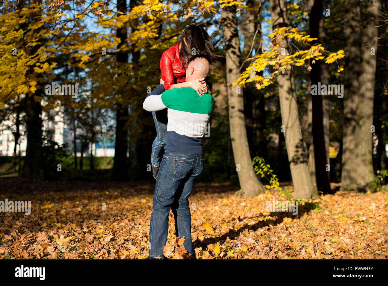 Male Carrying Smiling Female Stock Photo - Alamy