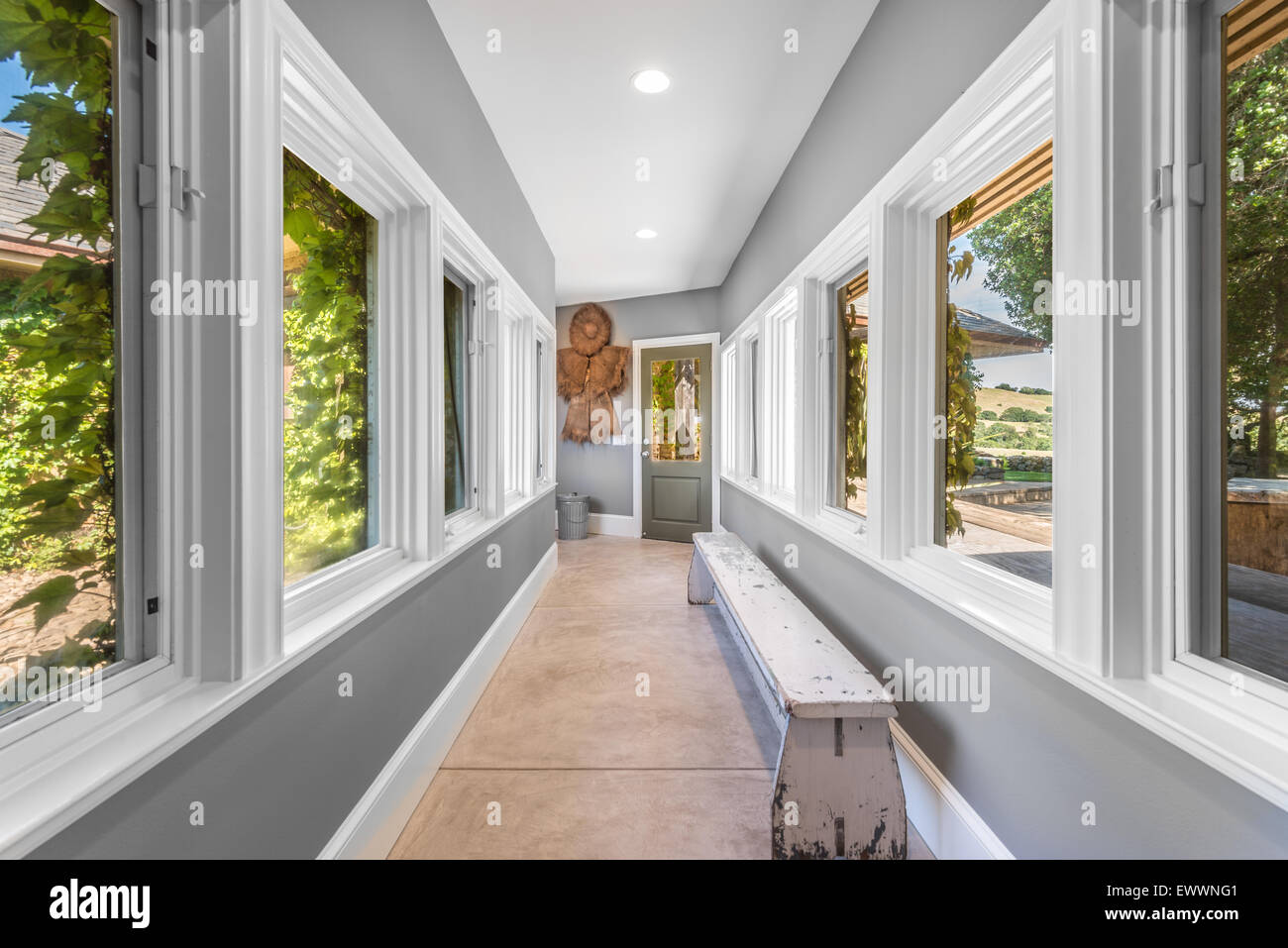 Long distressed wooden slab bench inside new modern home hallway Stock ...