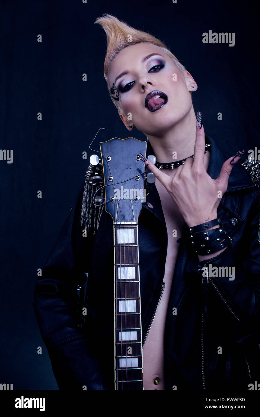 Fashion Rocker Style Model Girl Portrait. Hairstyle.Punk Woman Makeup ...