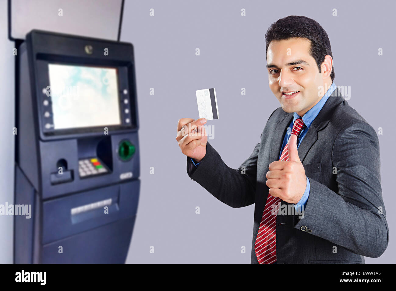 1 indian Business Man Credit Card showing Stock Photo - Alamy