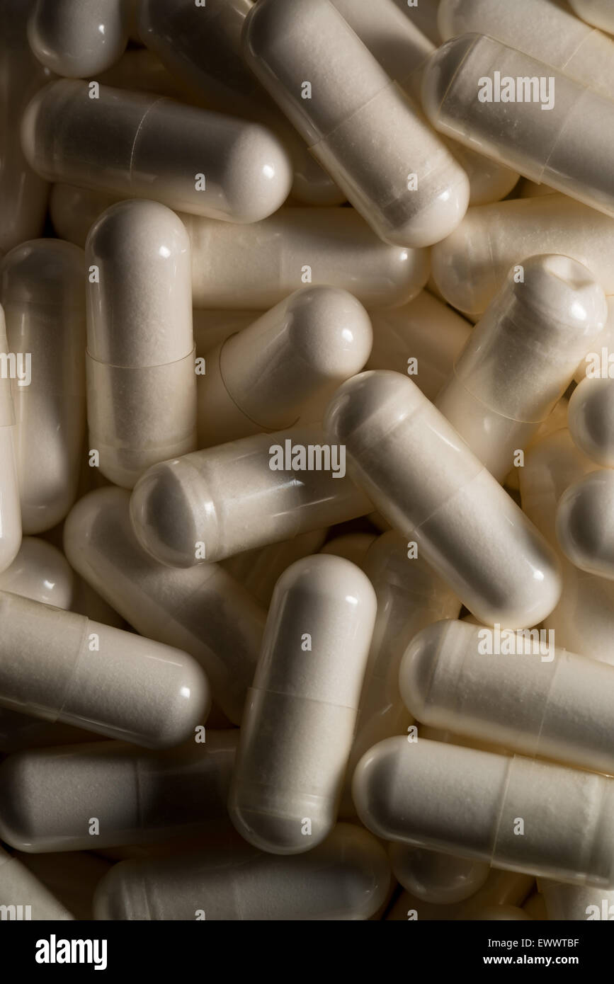 White Capsule Close Up Stock Photo - Alamy