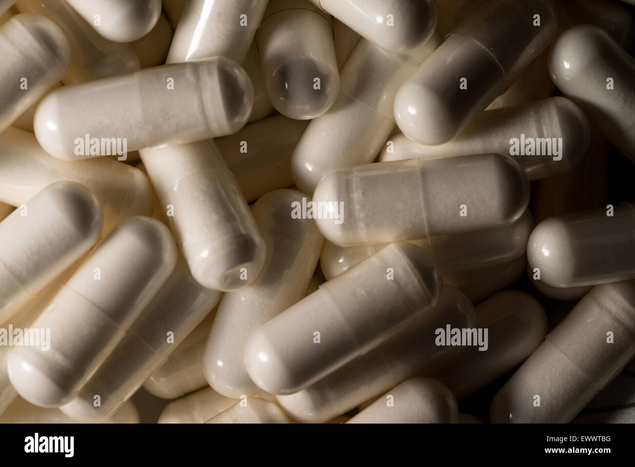 White Capsule Close Up Stock Photo - Alamy