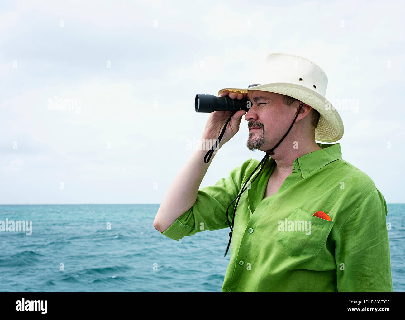 Monocular man watching hi-res stock photography and images - Alamy