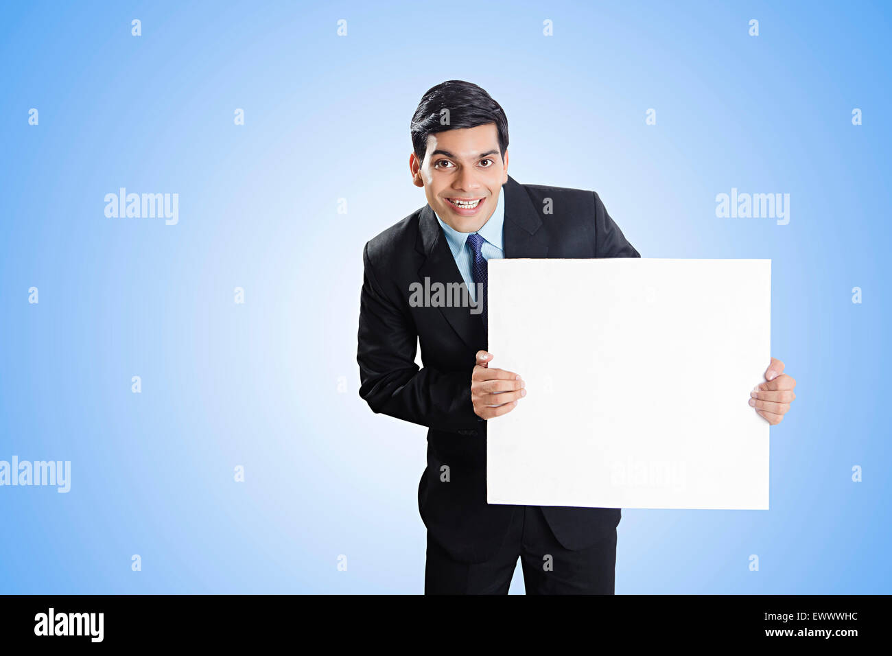 1 indian Business man showing Message Board Stock Photo - Alamy
