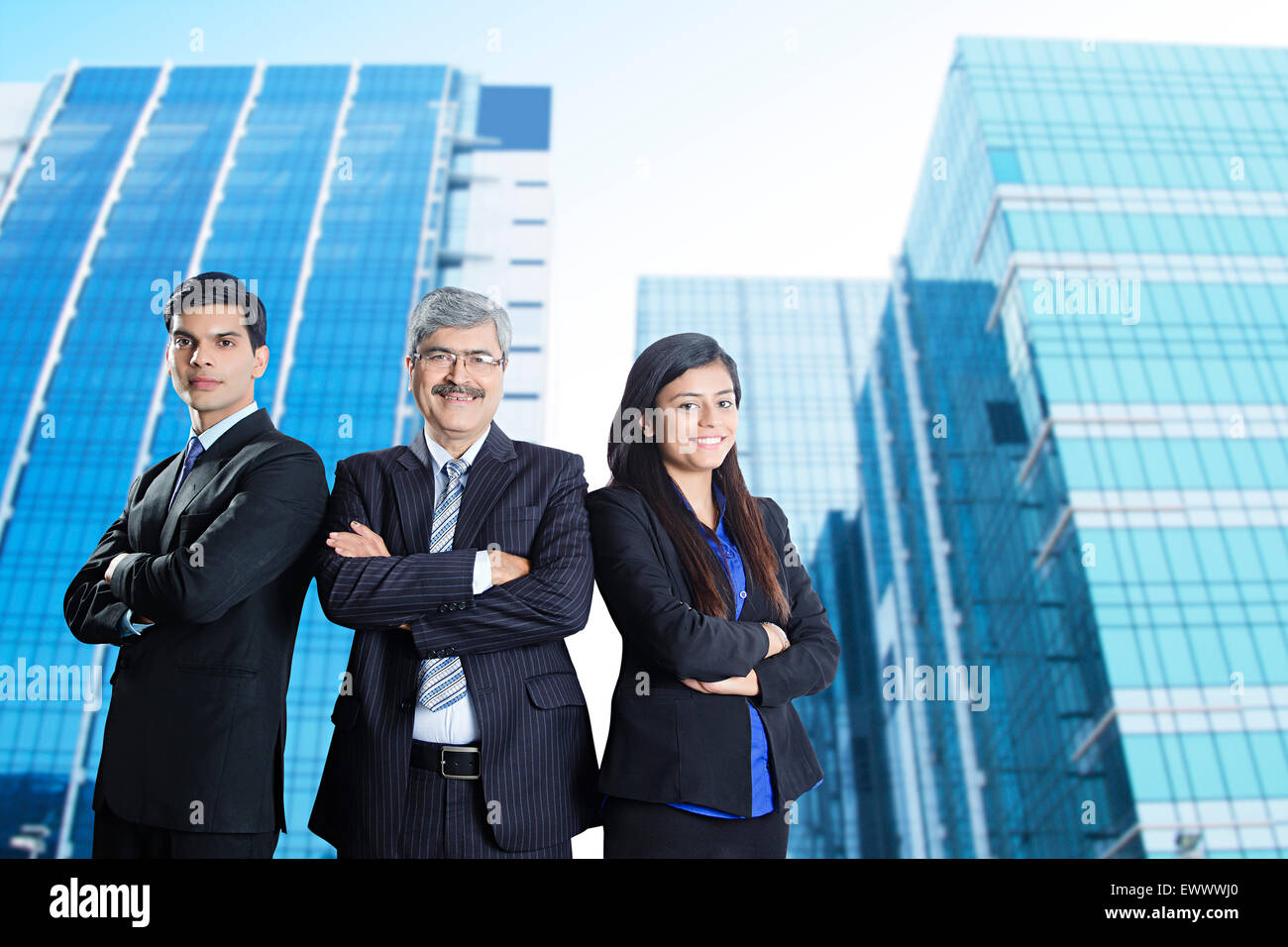 3 indian Business partner posing Stock Photo - Alamy