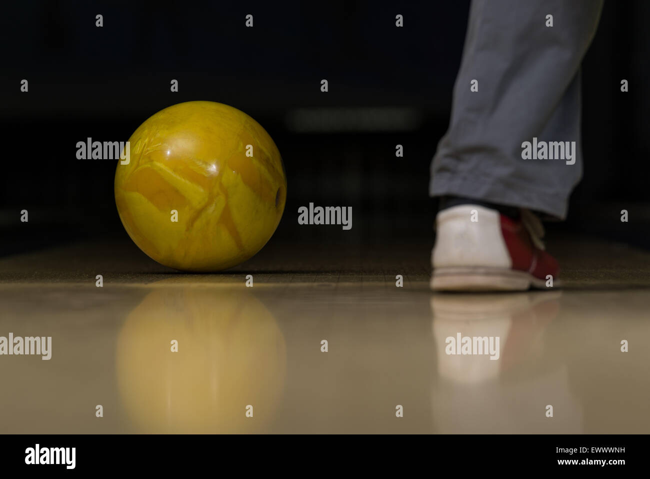 Bowling Ball Next To The Foot Stock Photo - Alamy
