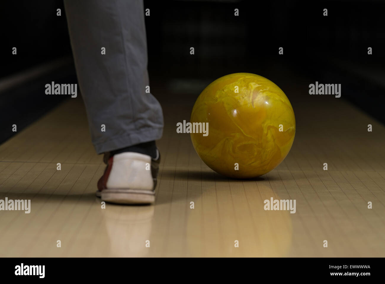 Bowling Ball Next To The Foot Stock Photo - Alamy