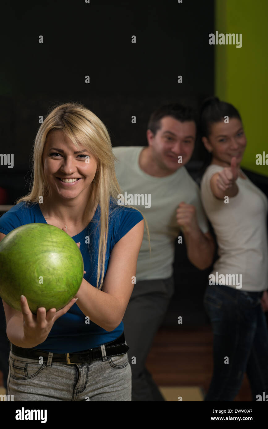 Friends Bowling Having Fun Stock Photo - Alamy