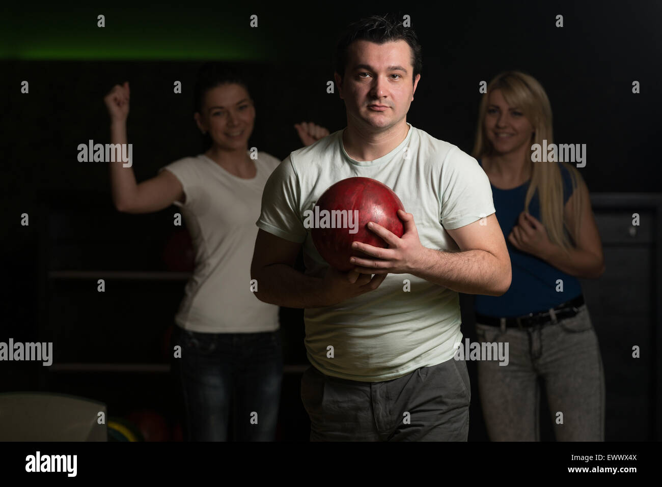Friends Bowling Together Stock Photo - Alamy