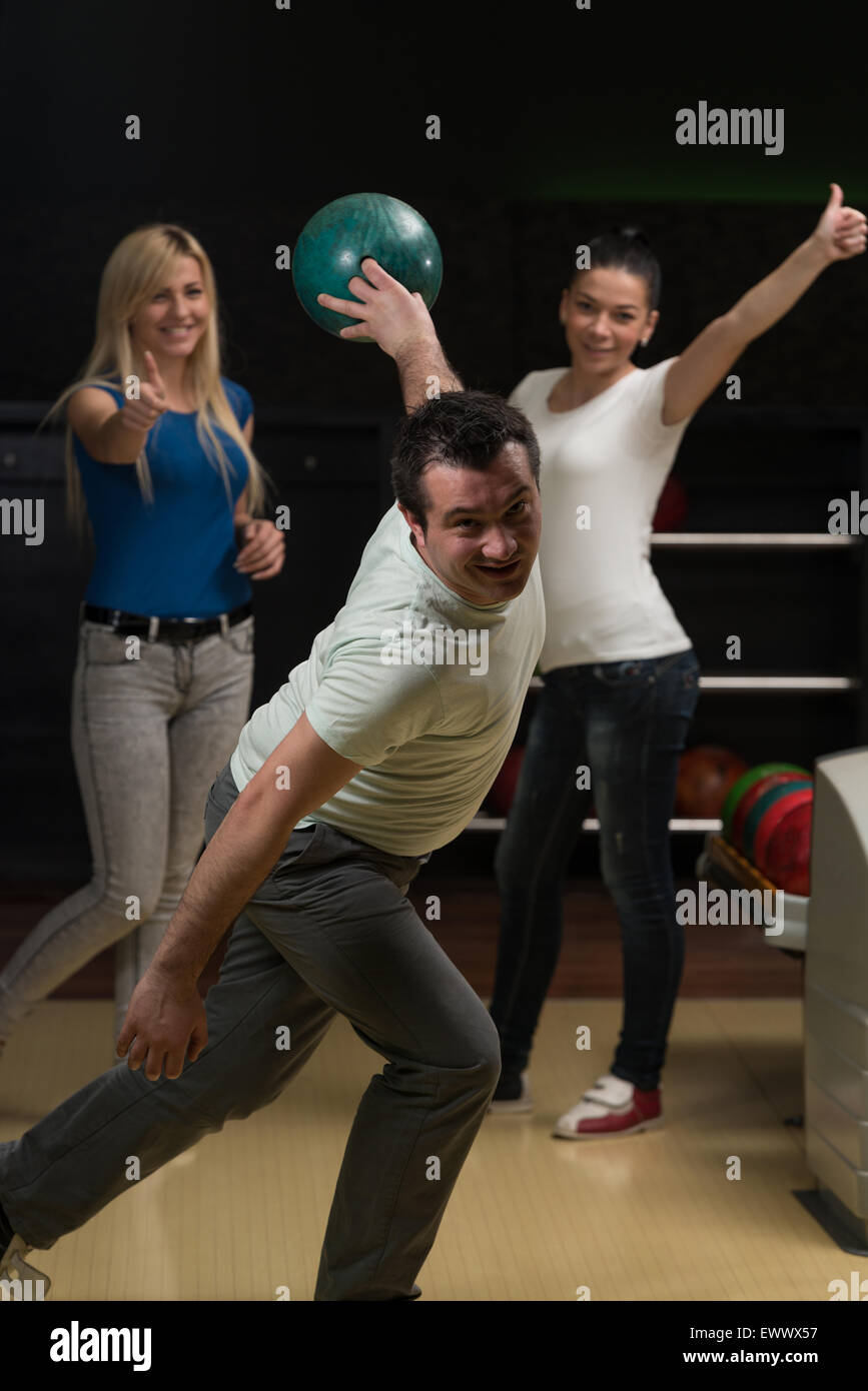 Friends Bowling Having Fun Stock Photo - Alamy