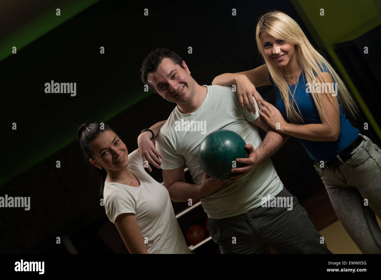 Friends Bowling Having Fun Stock Photo - Alamy