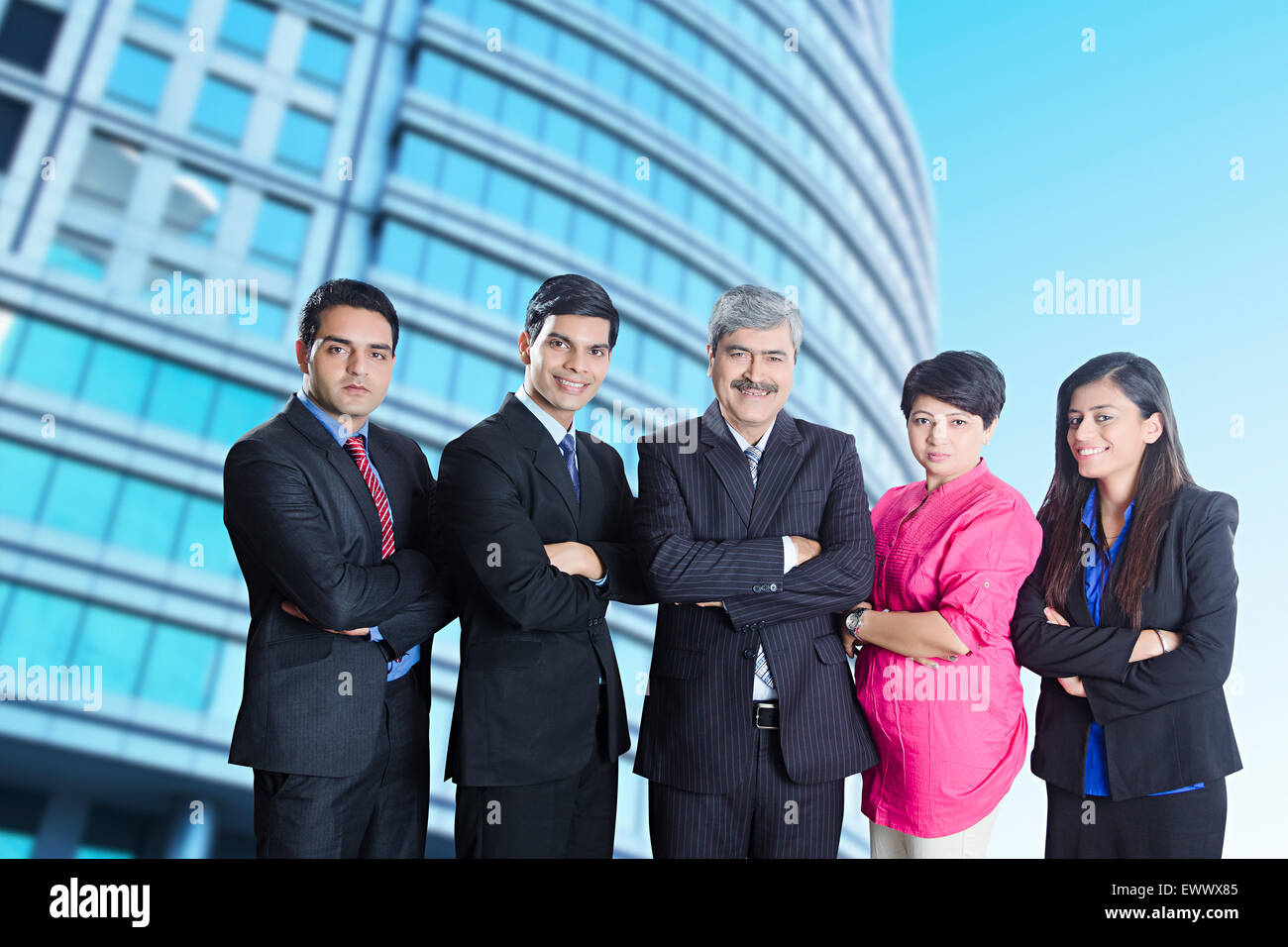 4 indian Business partner posing Stock Photo - Alamy