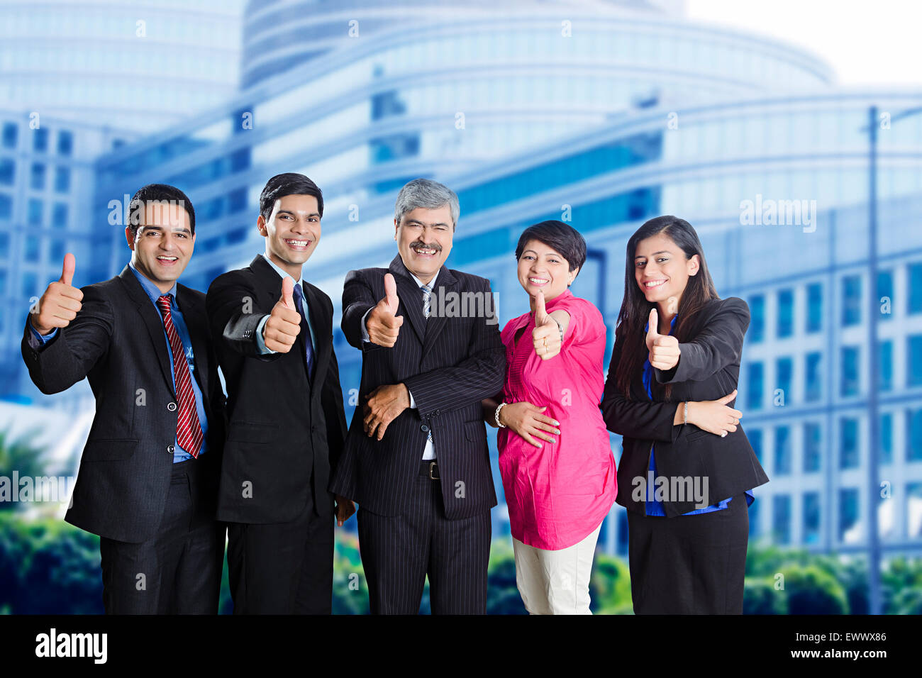 4 indian Business partner Thumbs Up showing Stock Photo - Alamy