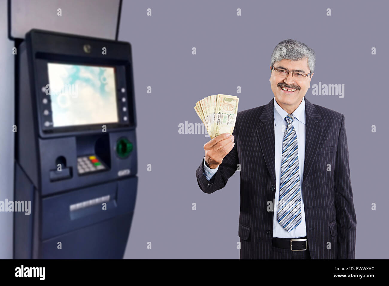 Senior people bank machines hi-res stock photography and images - Alamy