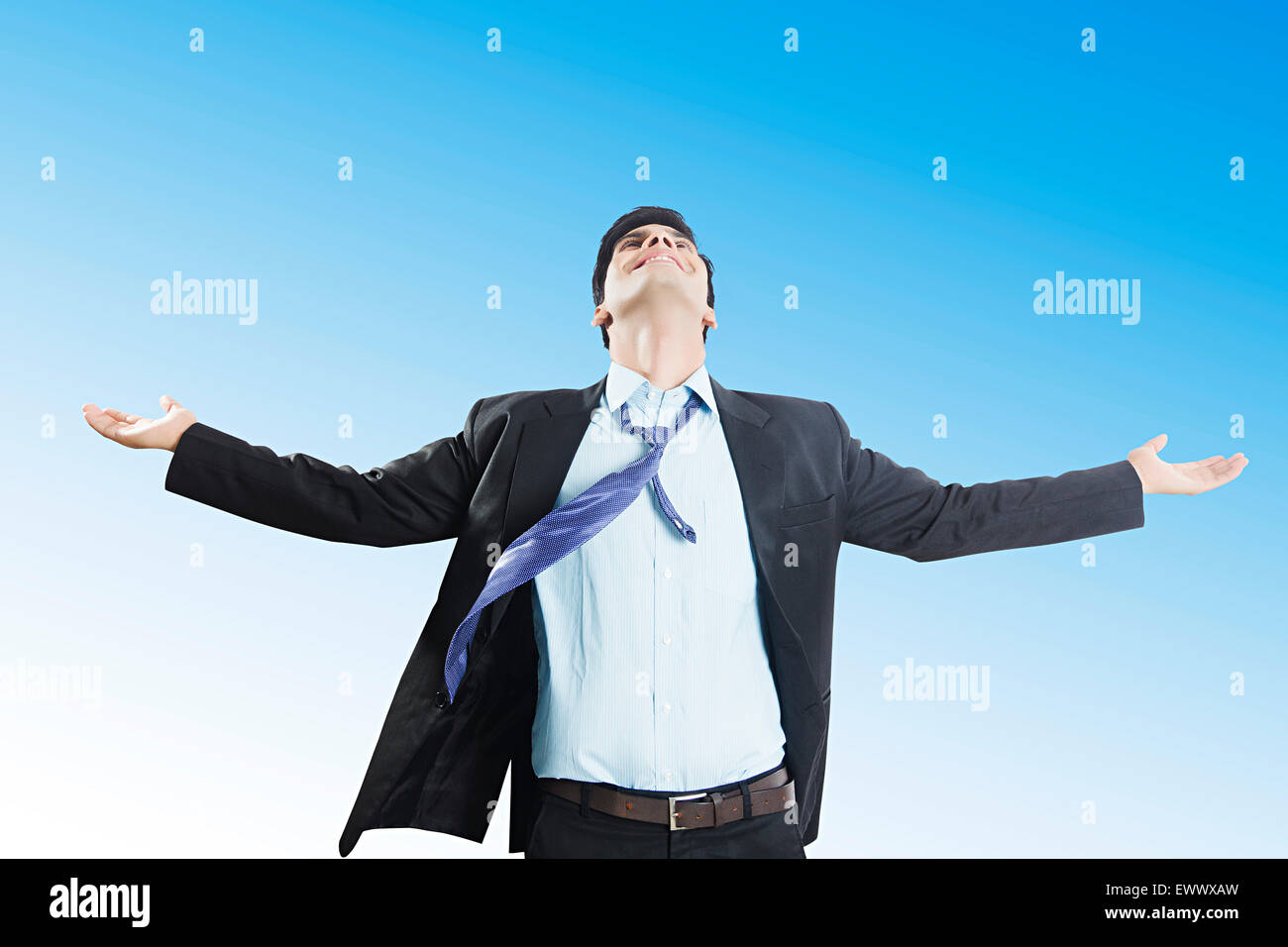 1 indian Business Man Outdoor standing Arms Outstretched Wishing Stock ...