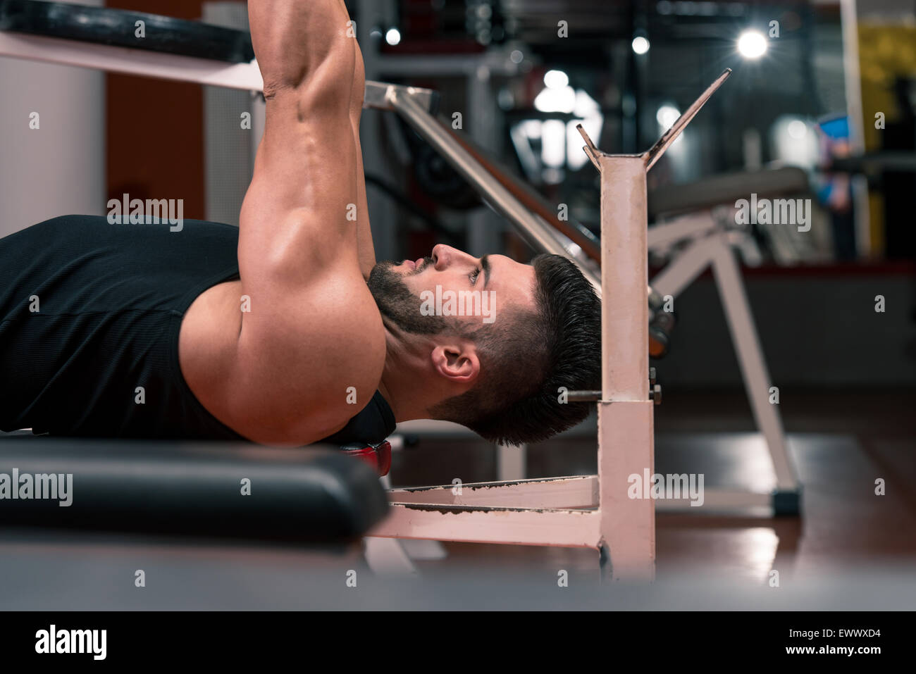 Young handsome man exercise triceps hi-res stock photography and images ...